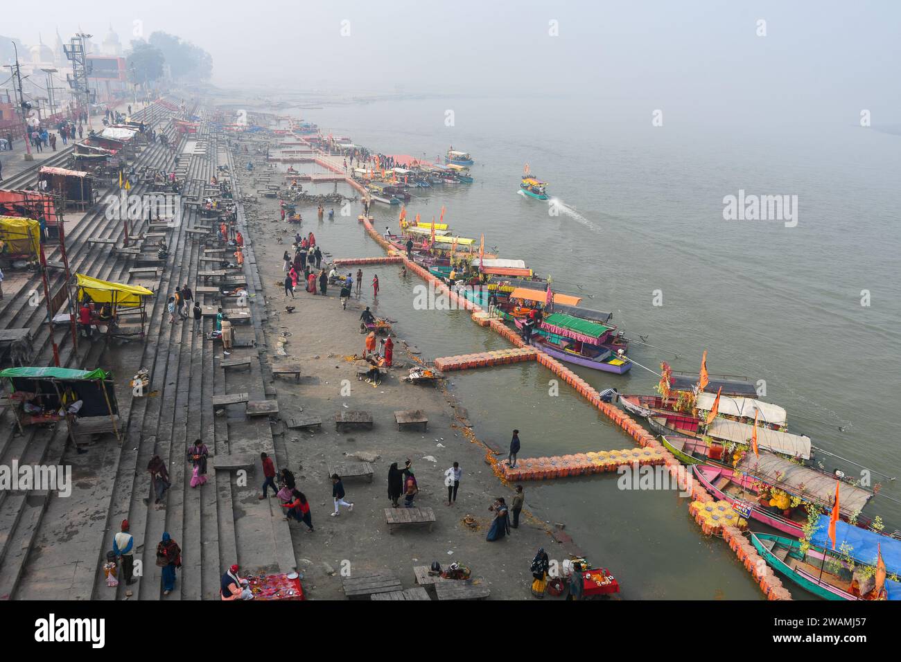 Devotees gather to take a holy dip in the Sarayu river. The ancient ...
