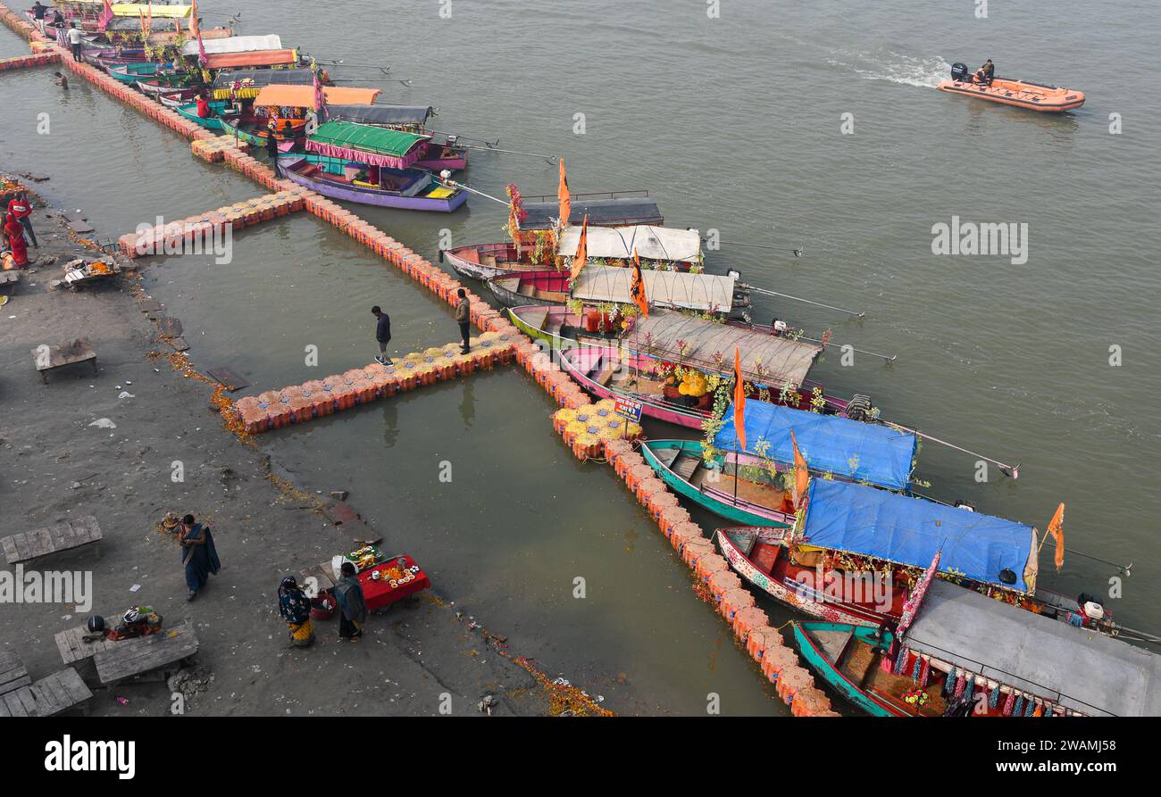 Boats are anchored on the banks of the Sarayu river. The ancient city ...