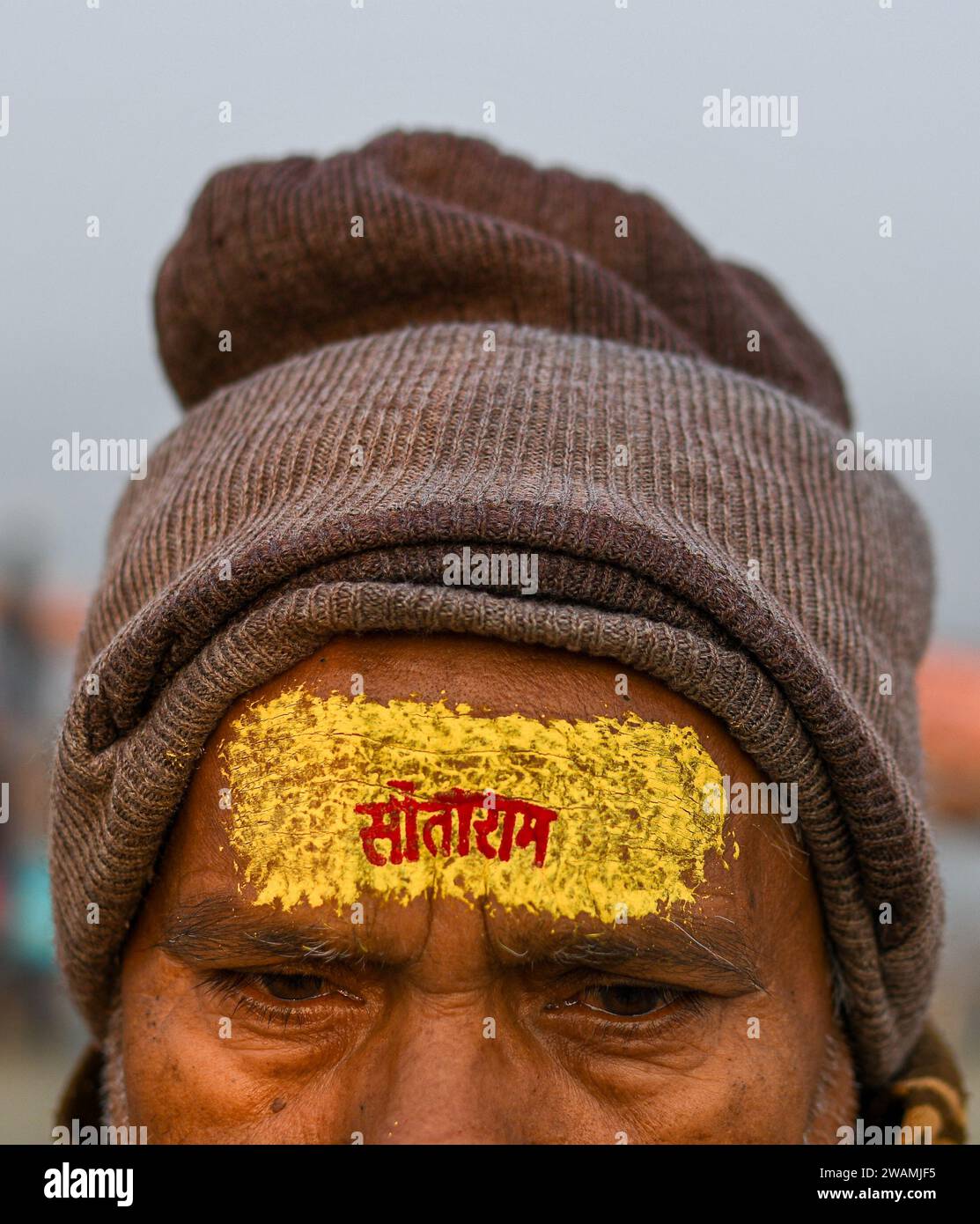 Ayodhya, India. 26th Dec, 2023. A devotee with the names of Lord Ram ...