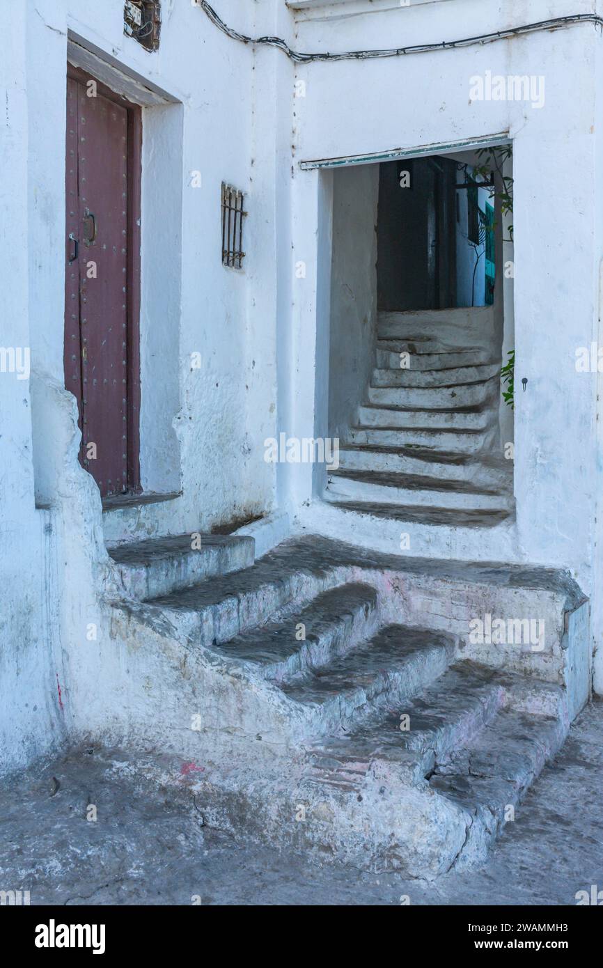 Street with stairs and passage under some old houses in the ...