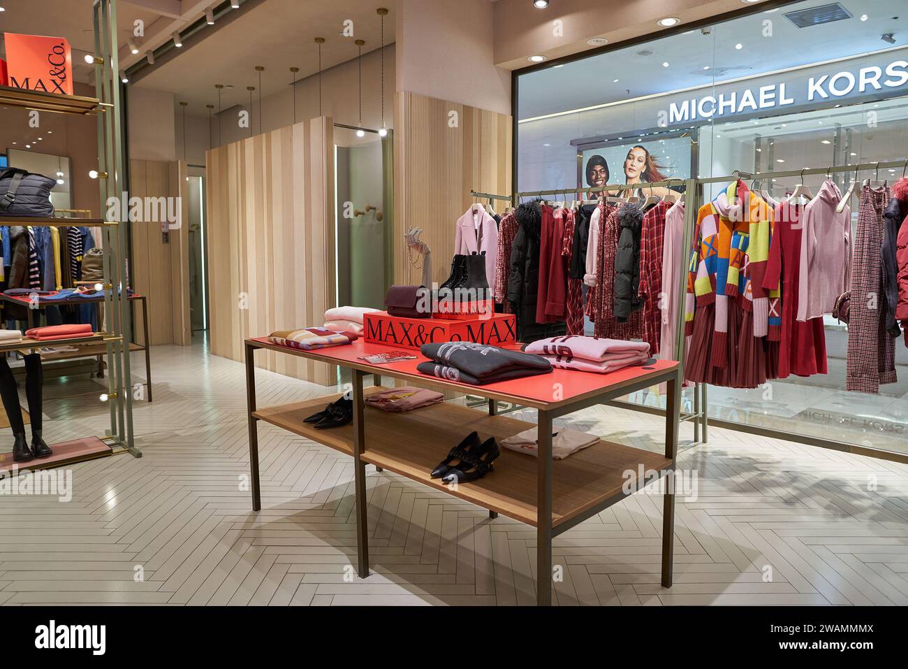 SHENZHEN, CHINA - NOVEMBER 21, 2019: apparel on display at MAX and Co ...