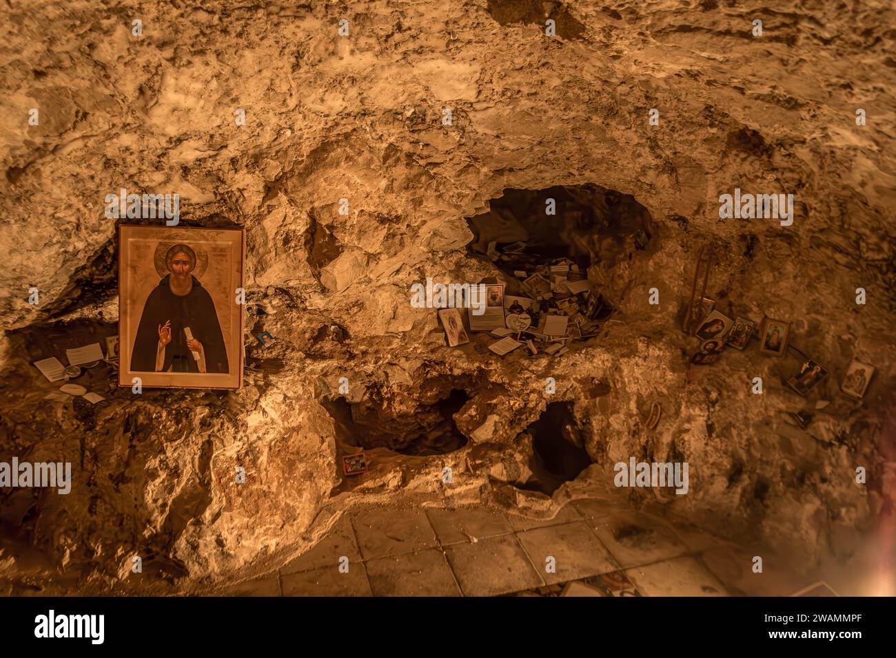 The icon of Christian saint inside the cave of Monastery of the ...