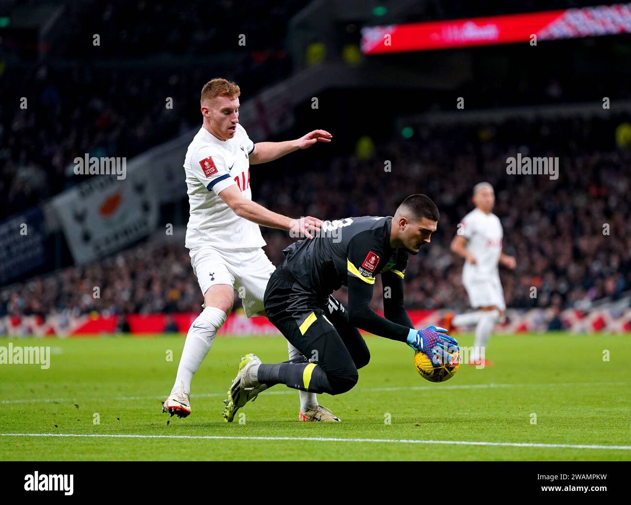 Tottenham Hotspur's Dejan Kulusevski (left) and Burnley goalkeeper ...