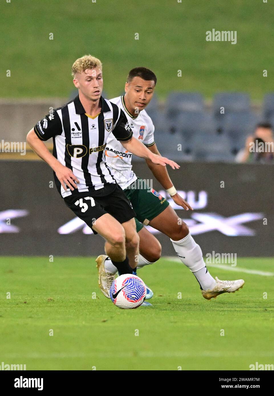 Leumeah, Australia. 05th Jan, 2024. Jed Drew (L) of Macarthur FC team ...