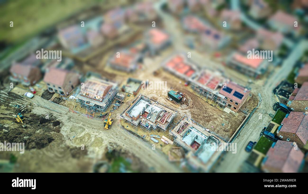 Aerial view of a residential construction site with partially built ...