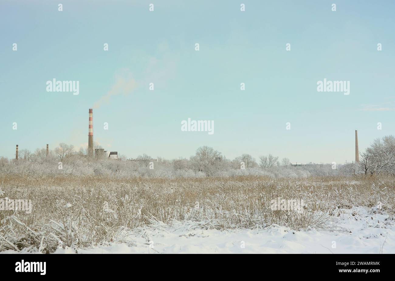 The industrial plant is located behind the swampy terrain hi-res stock ...