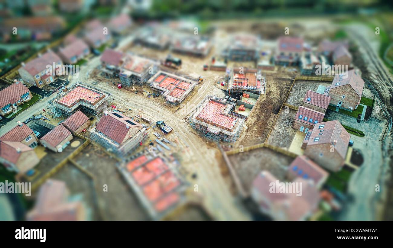 Aerial view of a residential construction site with partially built ...
