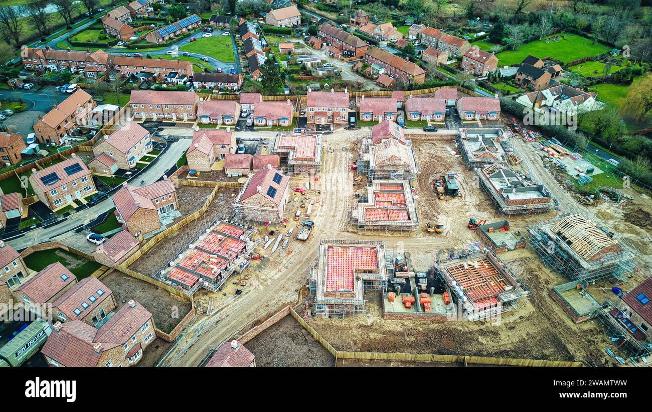 Aerial view of a residential construction site with partially built ...