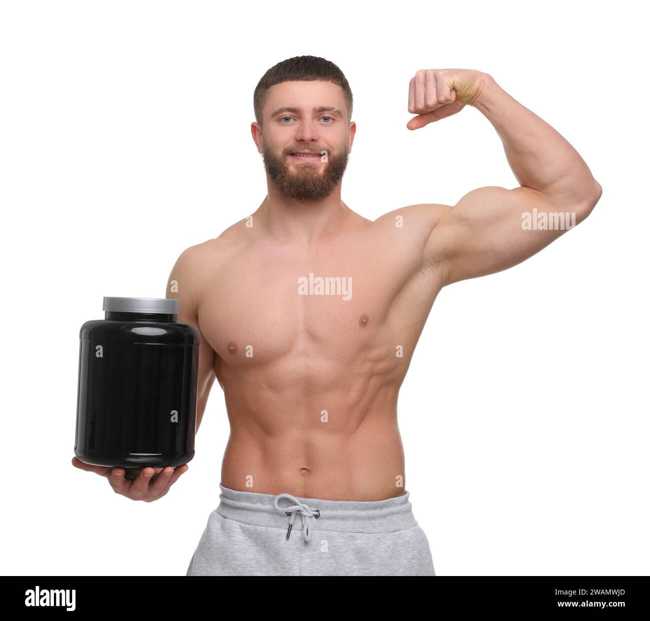 Young man with muscular body holding jar of protein powder on white ...