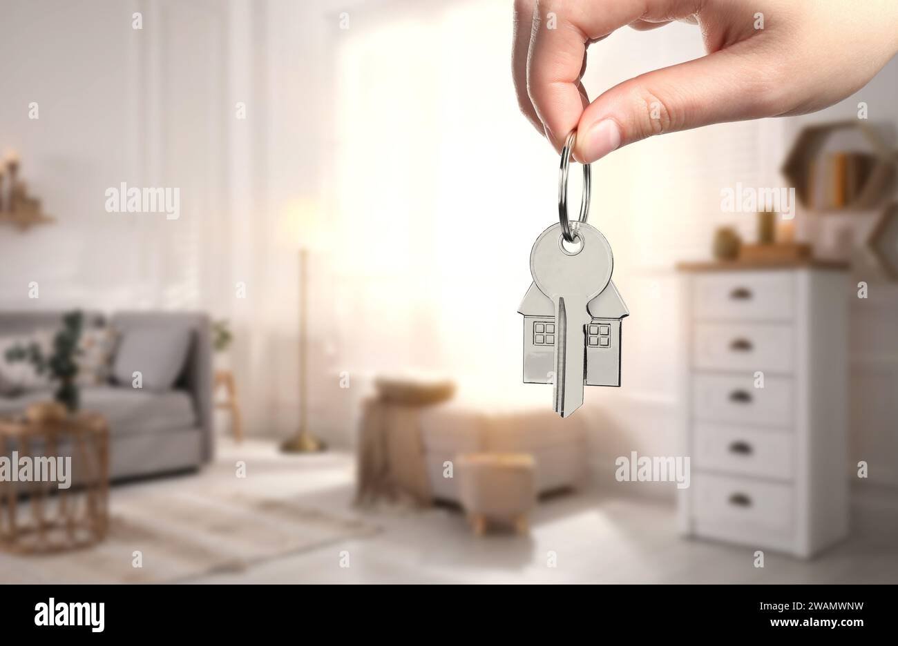 Hand holding key blurred light hi-res stock photography and images - Alamy