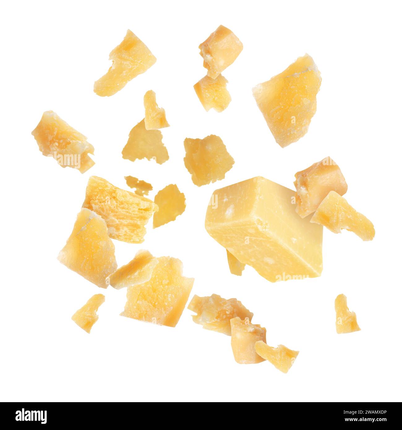 Tasty parmesan cheese falling on white background Stock Photo - Alamy