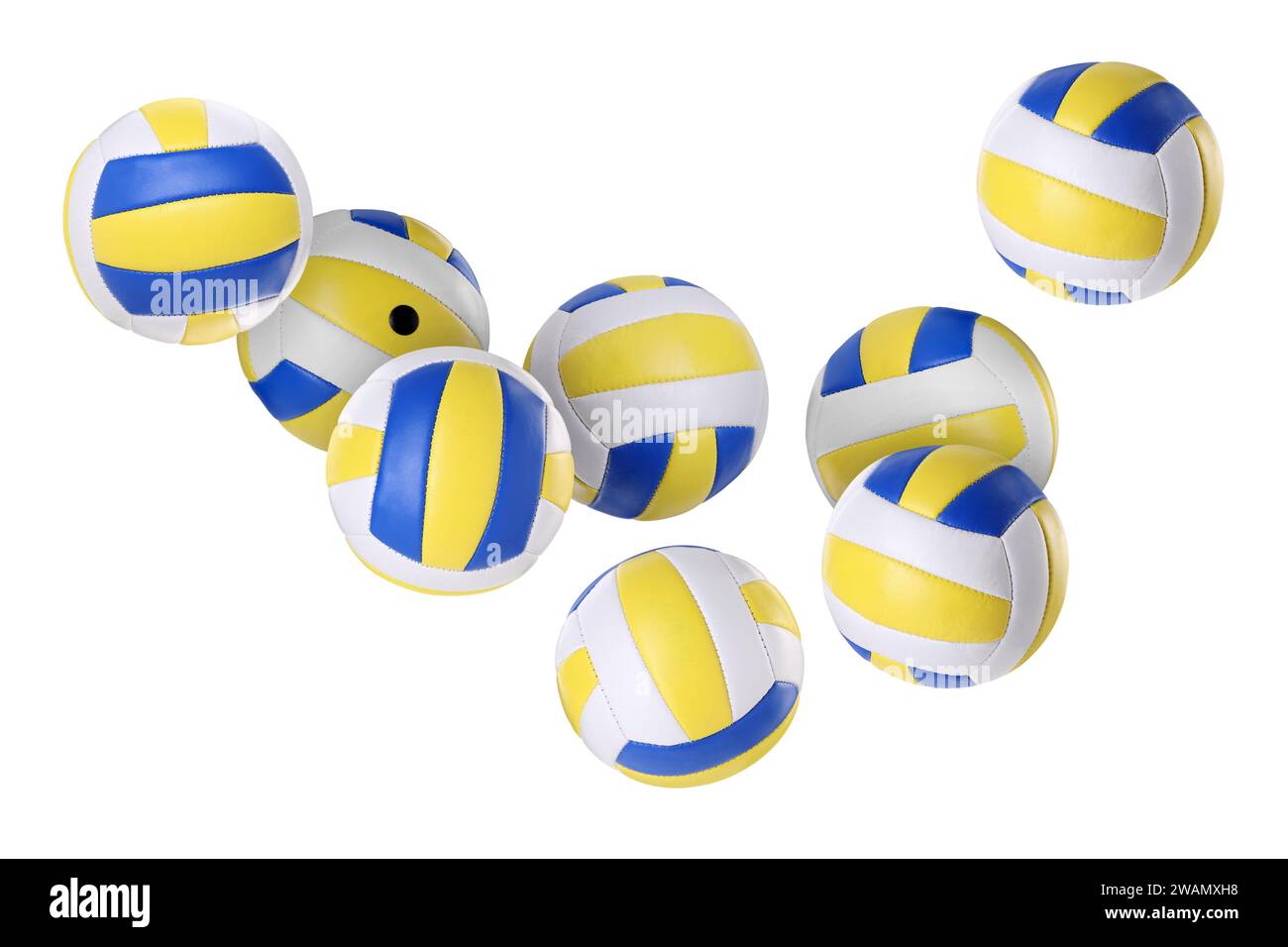 Many volleyball balls flying on white background Stock Photo - Alamy