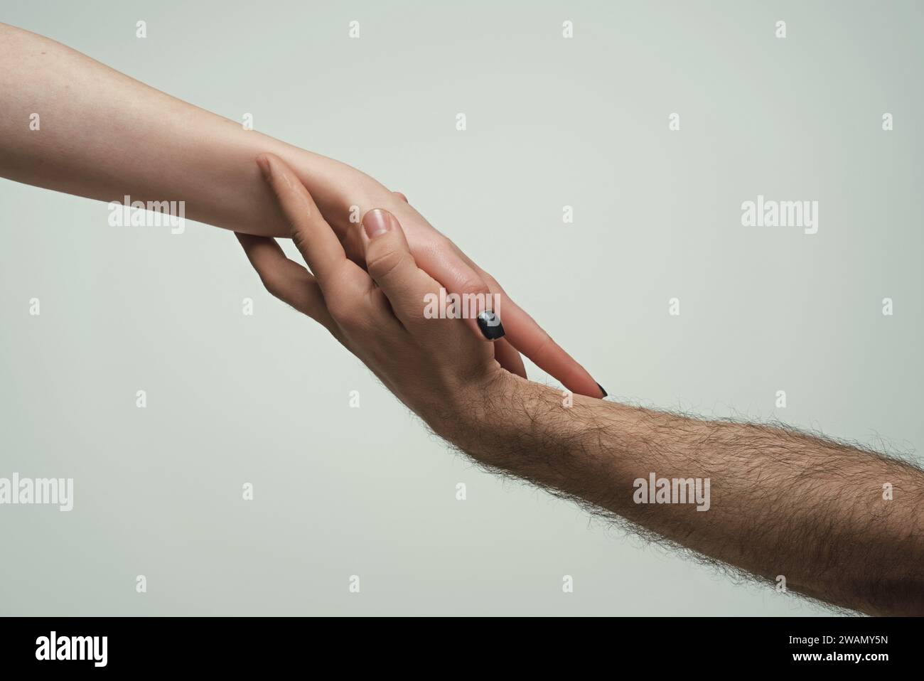 Helping hand. Holding hands, close up. Giving a helping hand. Rescue ...