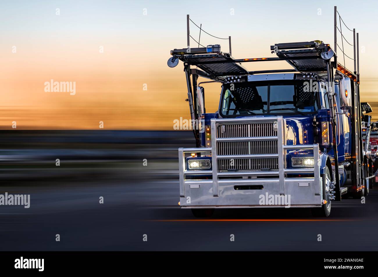 Blue classic industrial car hauler big rig semi truck tractor with ...