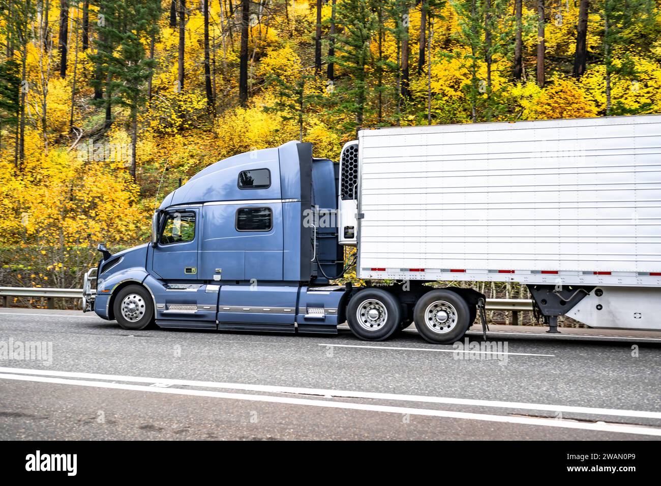 Long carrier blue big rig semi truck with extended cab for truck driver ...