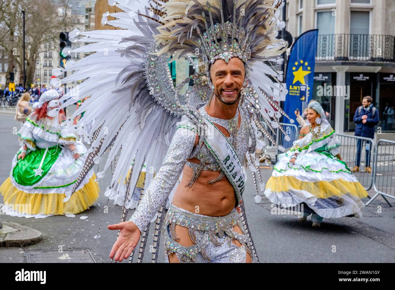 Members of the London School of Samba make their way to the start of ...