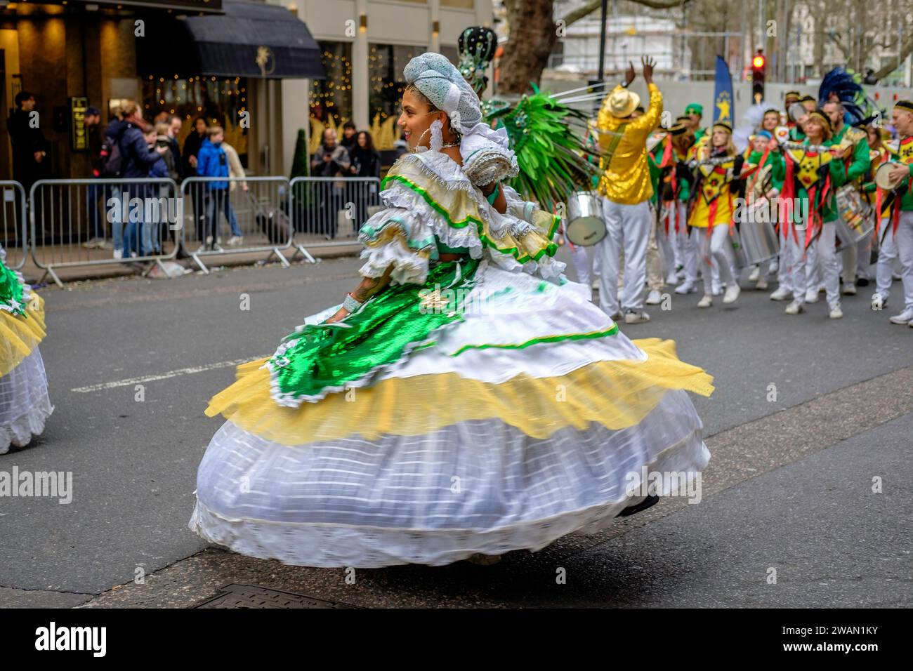 Members of the London School of Samba make their way to the start of ...