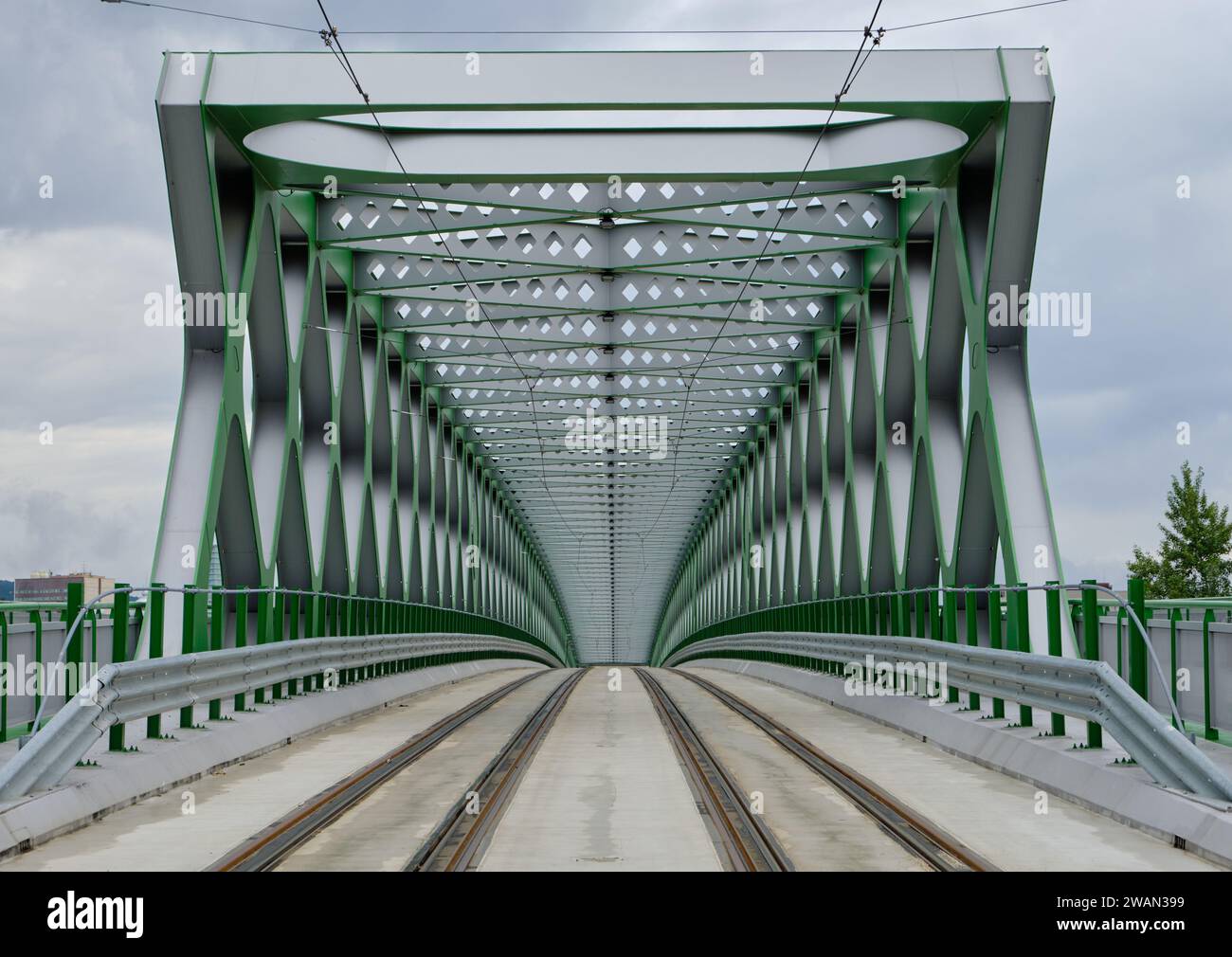Metal Bridge over the Danube with a tram line, dedicated pedestrian ...