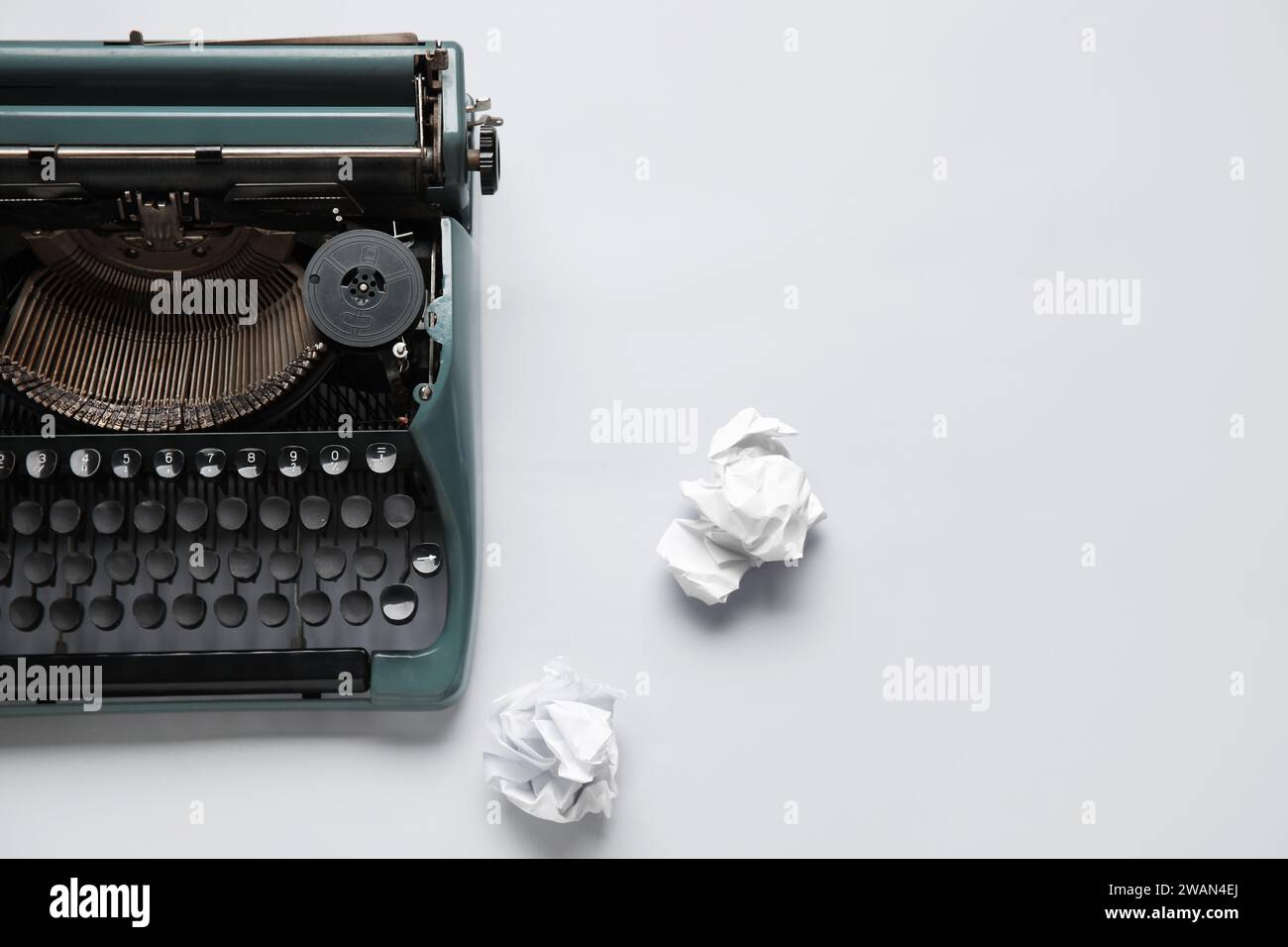 Vintage typewriter with crumpled paper on white background Stock Photo ...