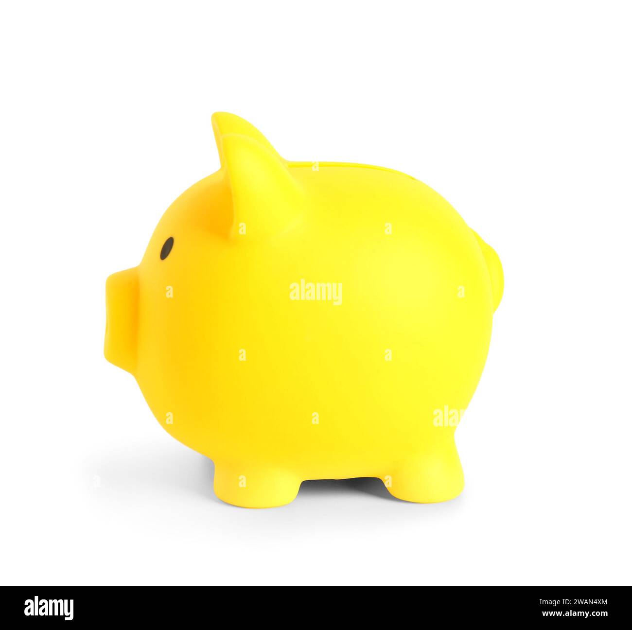 Yellow piggy bank isolated on white background Stock Photo - Alamy