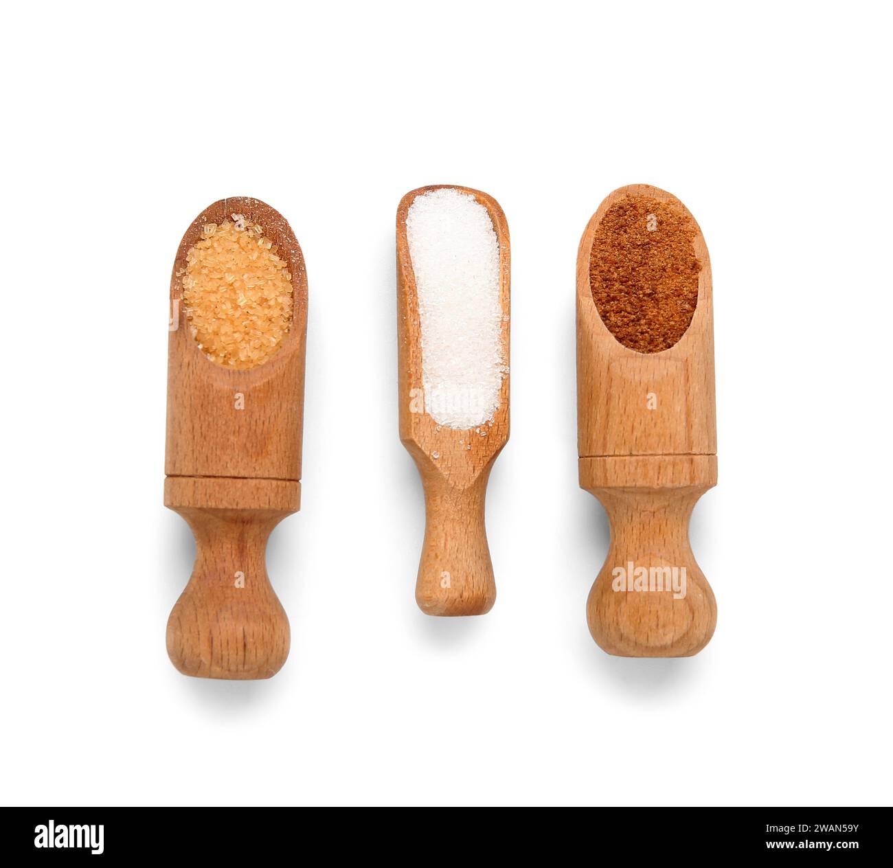 Scoops with different types of sugar on white background Stock Photo ...
