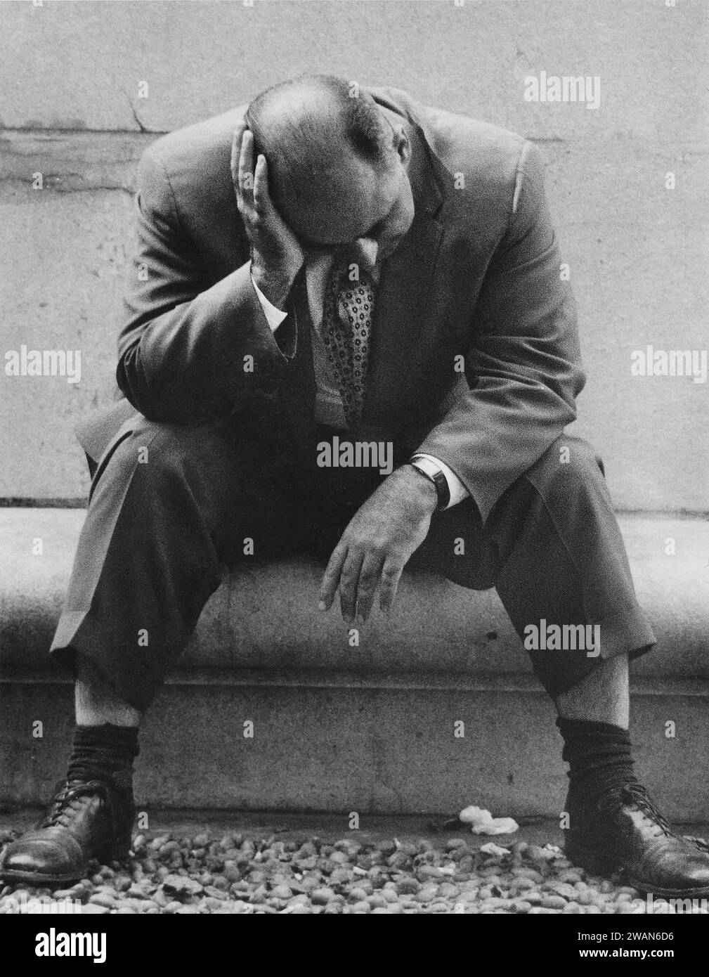 Man sitting with head resting on hand, New York City, New York, USA ...