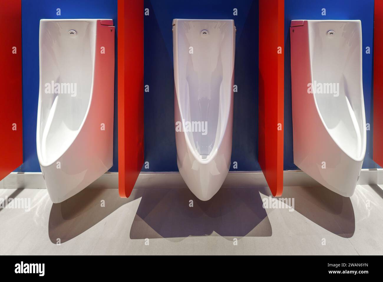 Man toilet bowl in a spotless public restroom scene reflects modern ...