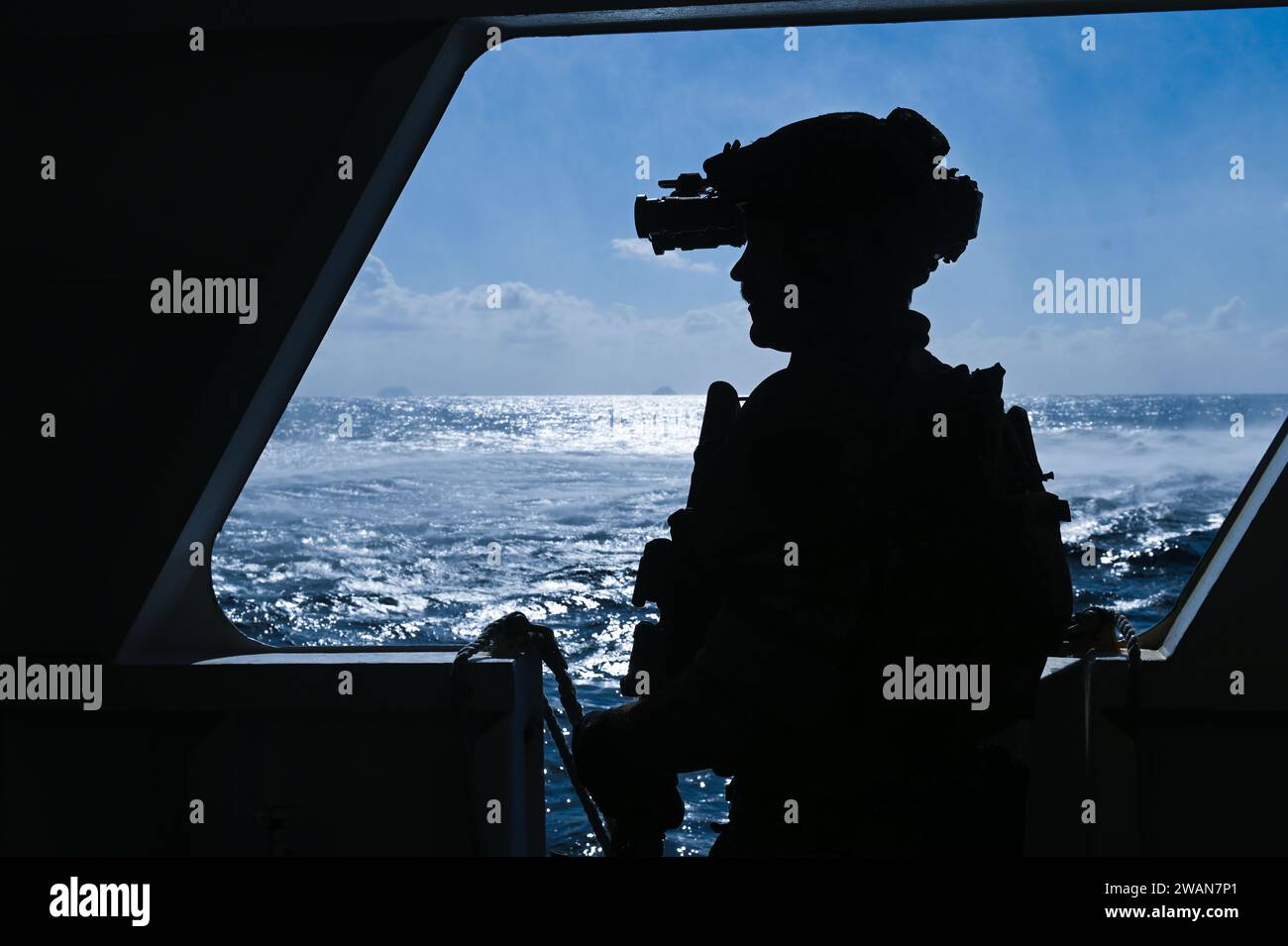 A West Coast-based Naval Special Warfare (NSW) operator conducts visit ...