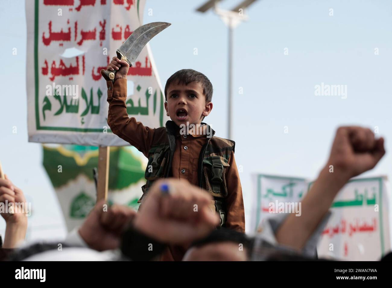 Sanaa, Yemen. 5th Jan, 2024. A boy holds up dagger known as the ...