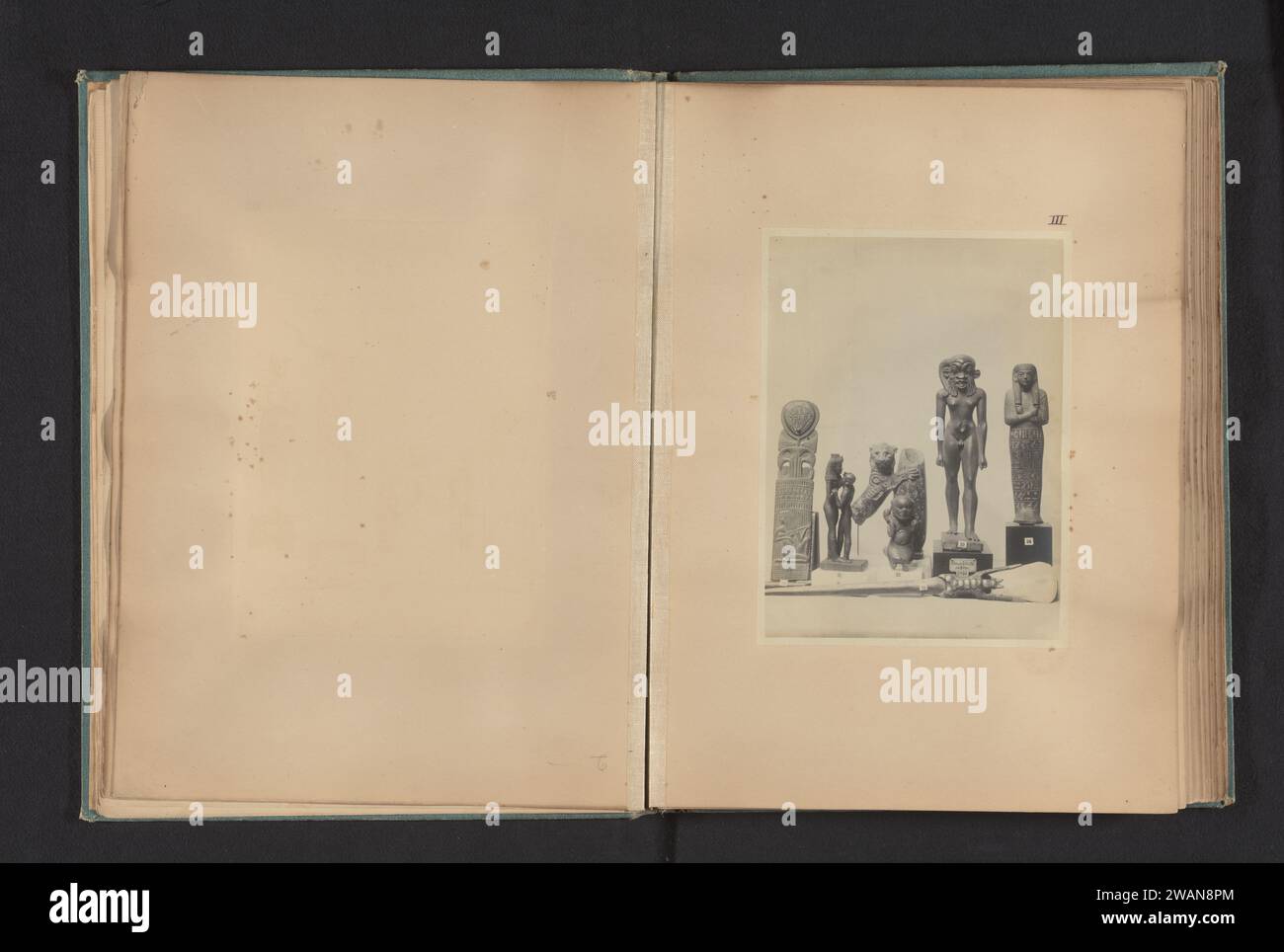 Seven Egyptian objects, including a bronze sculpture from ISIS with ...