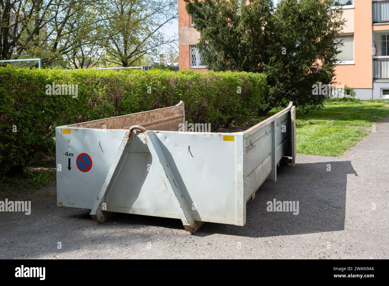 An empty construction waste container ready for materials from a ...