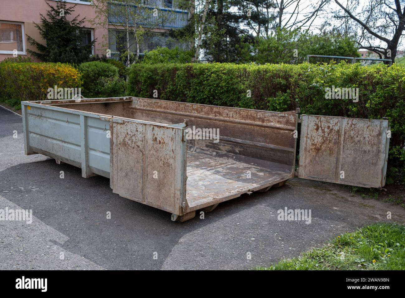 An empty construction waste container ready for materials from a ...