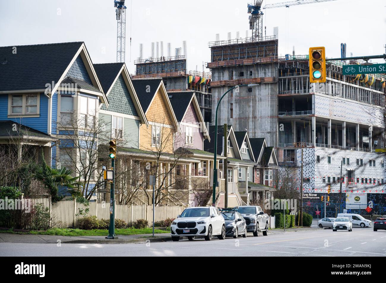Old houses overwhelmed by large condo construction. Vancouver’s ...