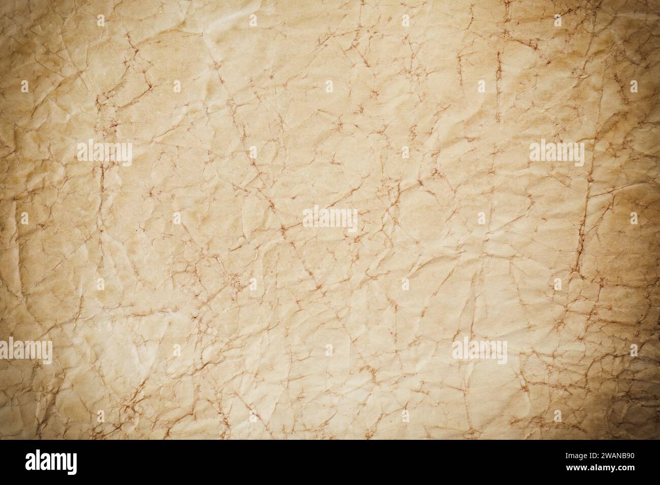 Crumpled old paper as background. Texture of parchment Stock Photo - Alamy