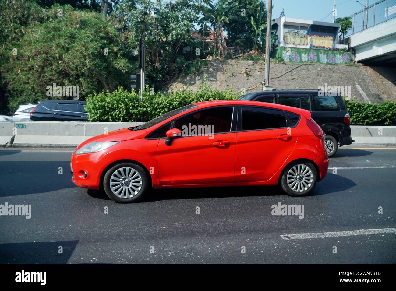 City car red Ford Fiesta at Higway Jakarta Outer Ring Road, Jakarta ...
