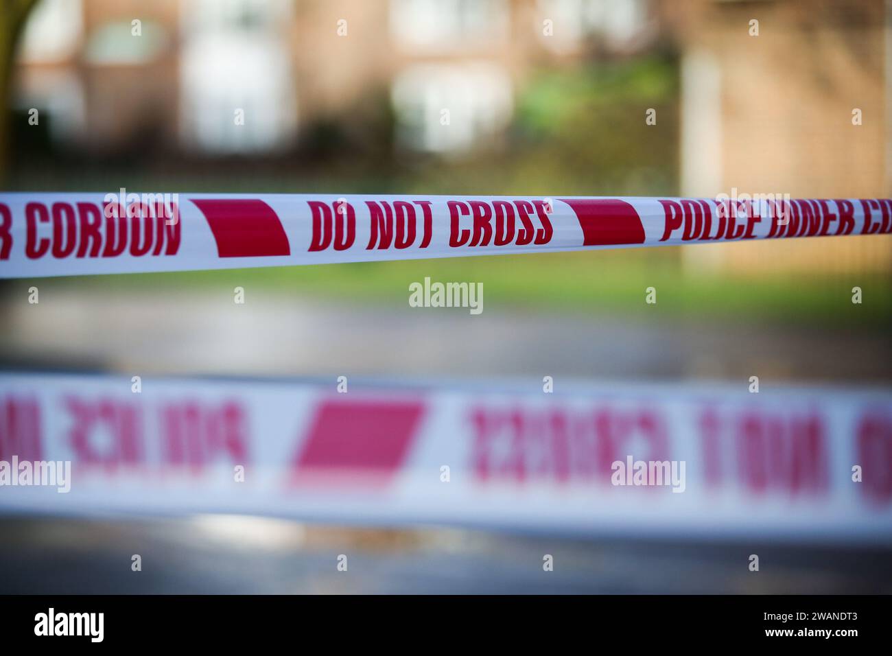 London, UK. 12th Dec, 2023. Police tapes at a crime scene in London ...