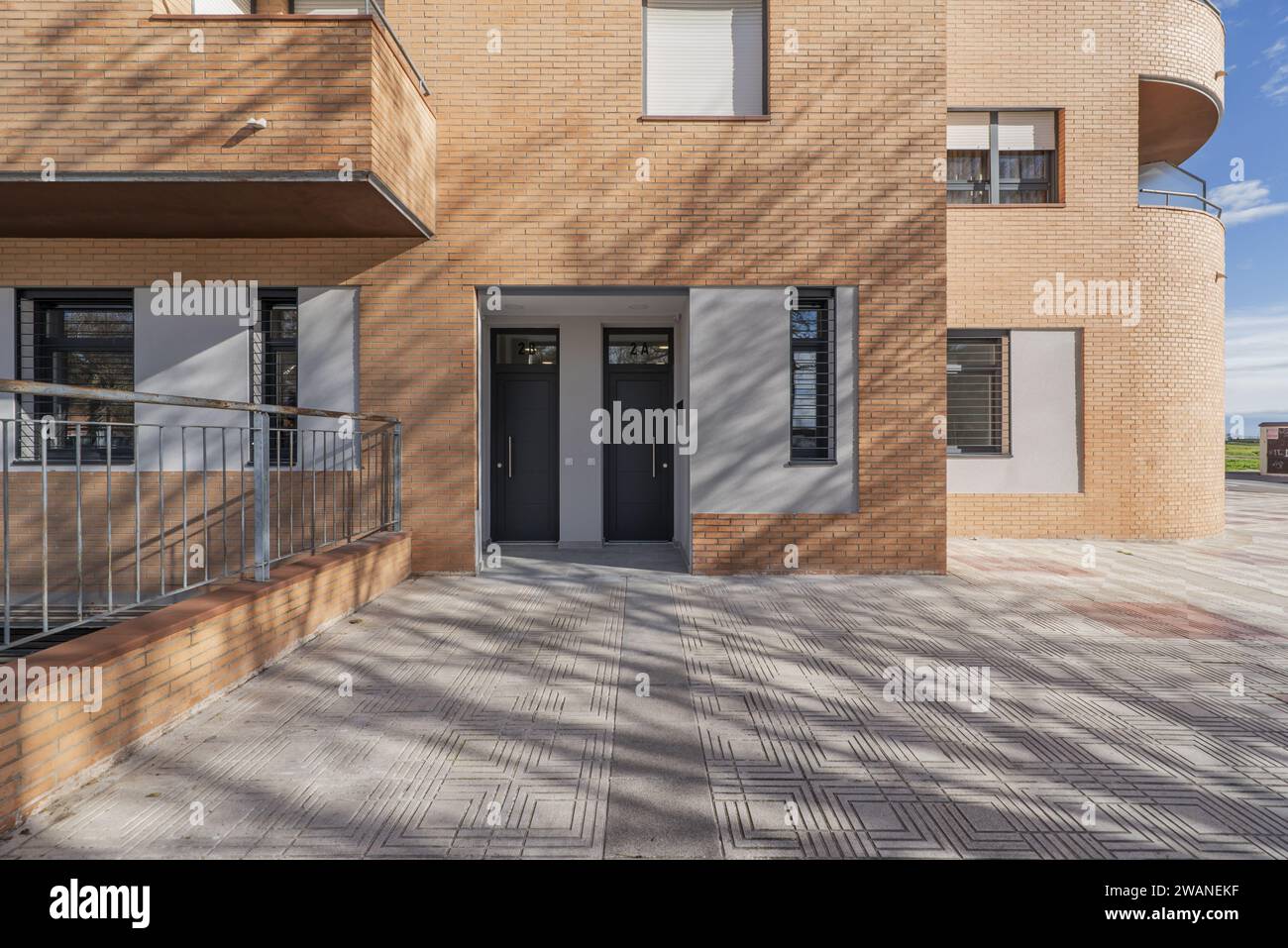 Facades of a block of residential buildings with access to loft-style ...
