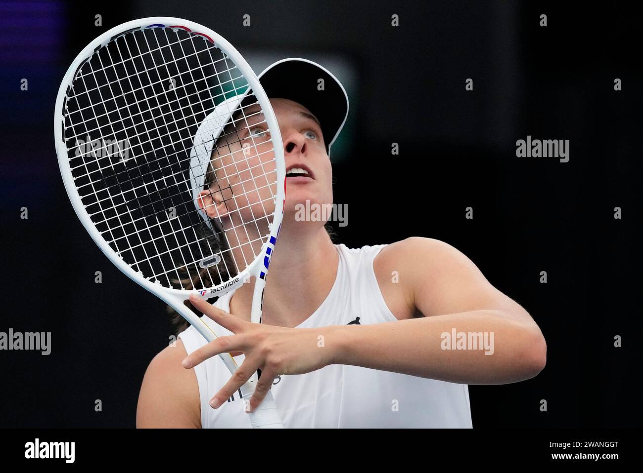 Poland's Iga Swiatek plays a forehand return to Caroline Garcia of ...