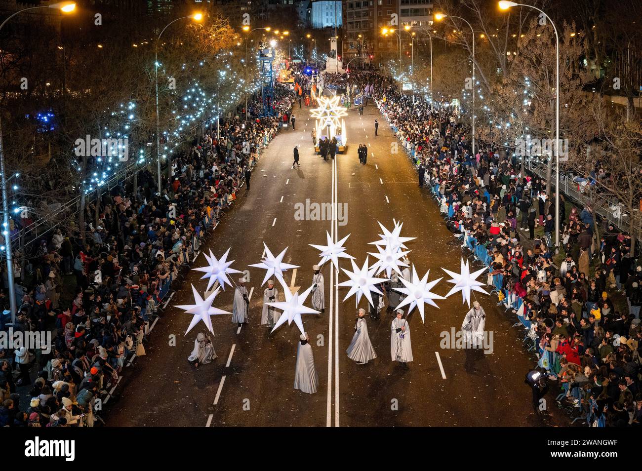 Madrid, Spain. 06th Jan, 2024. Participants hold star-shaped balloons ...