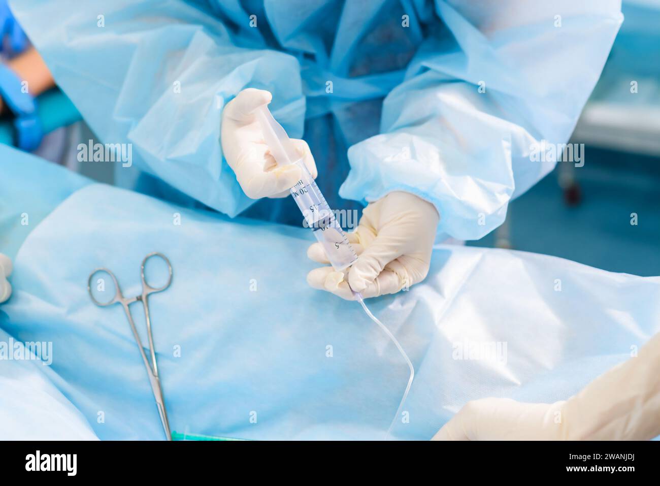 Professional quality medicine. The assistant doctor prepares the ...