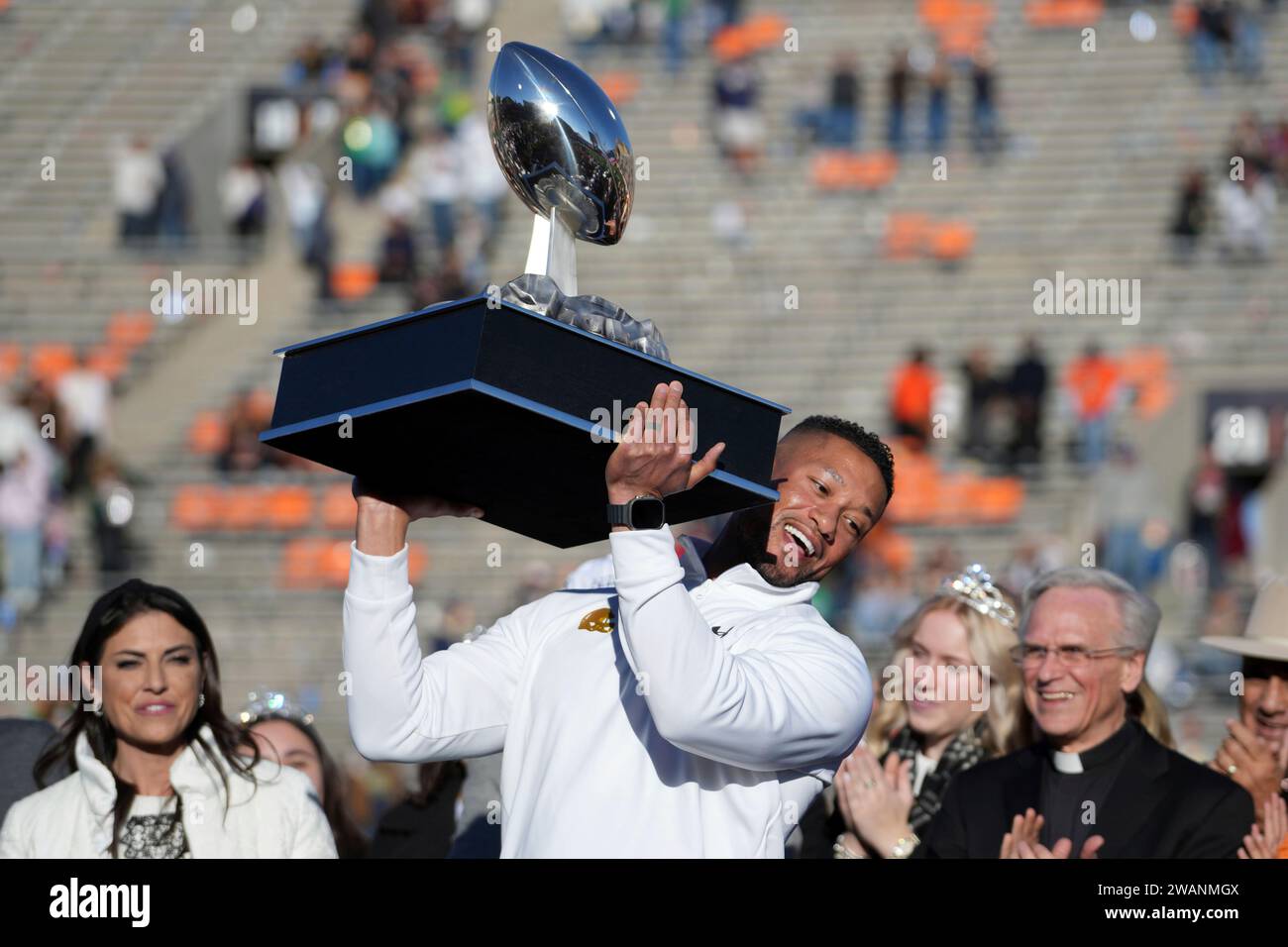 Notre Dame Fighting Irish head coach Marcus Freeman holds the ...