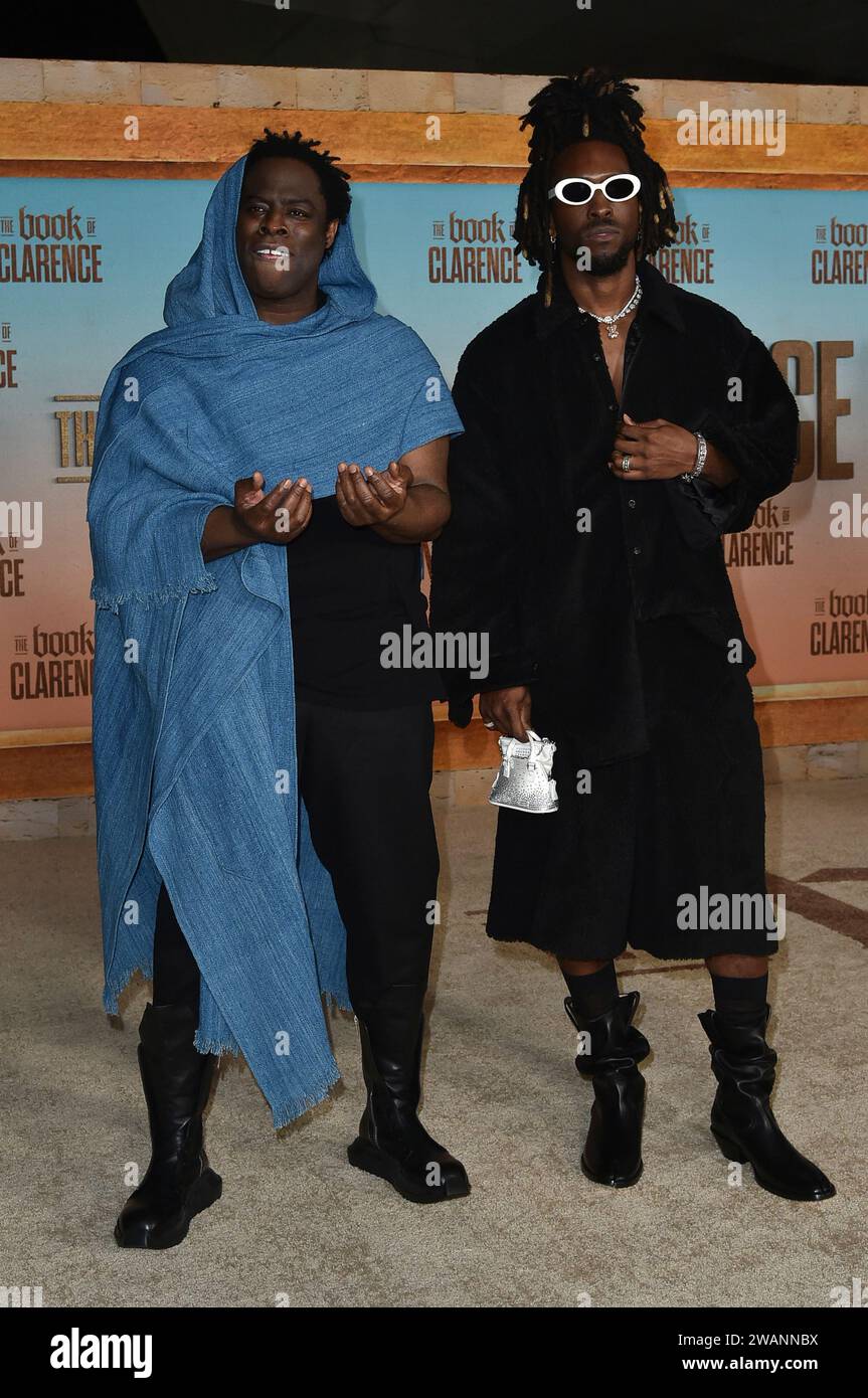Jeymes Samuel, left, and SAINt JHN arrive at the premiere of "The Book ...
