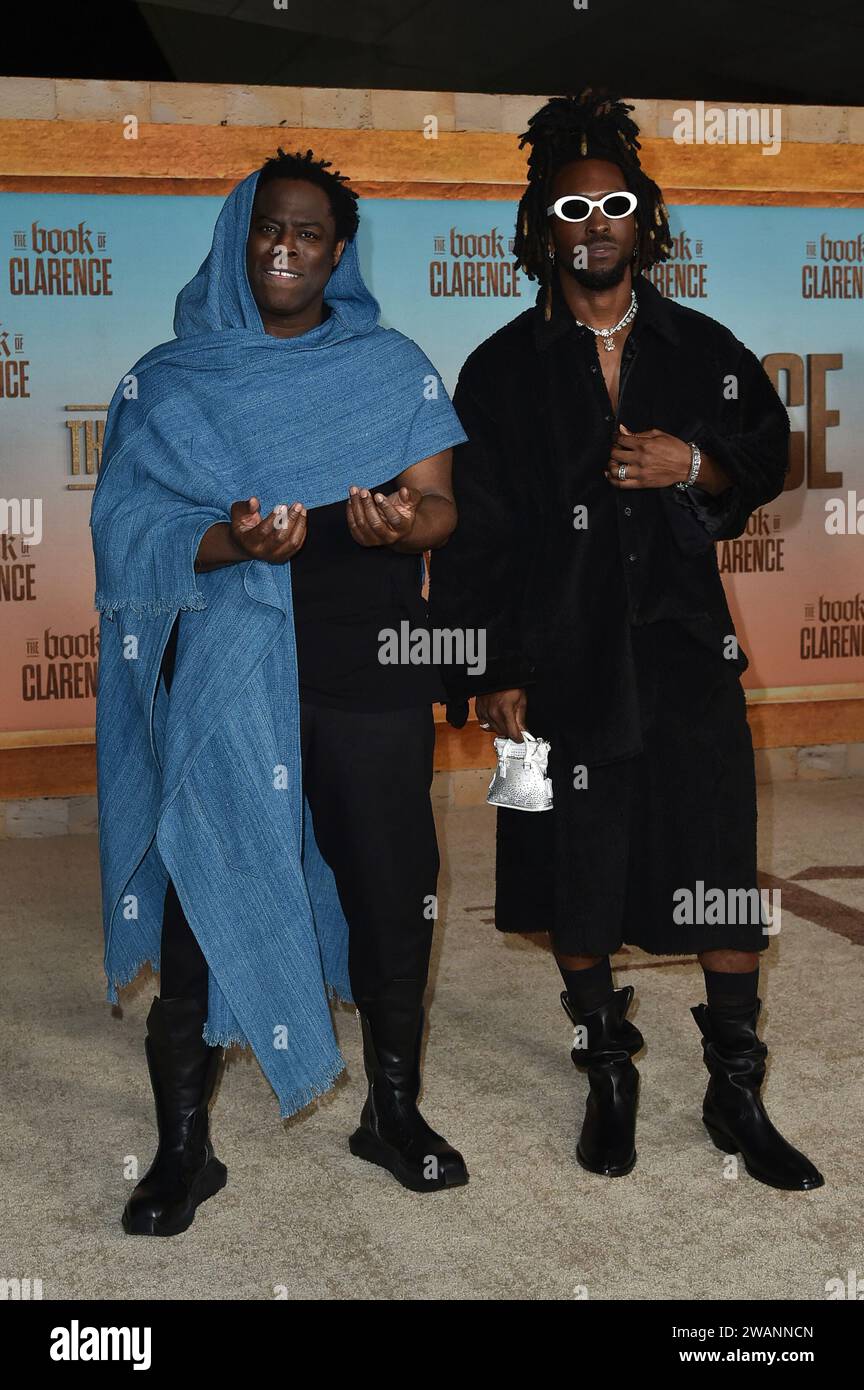 Jeymes Samuel, left, and SAINt JHN arrive at the premiere of "The Book ...