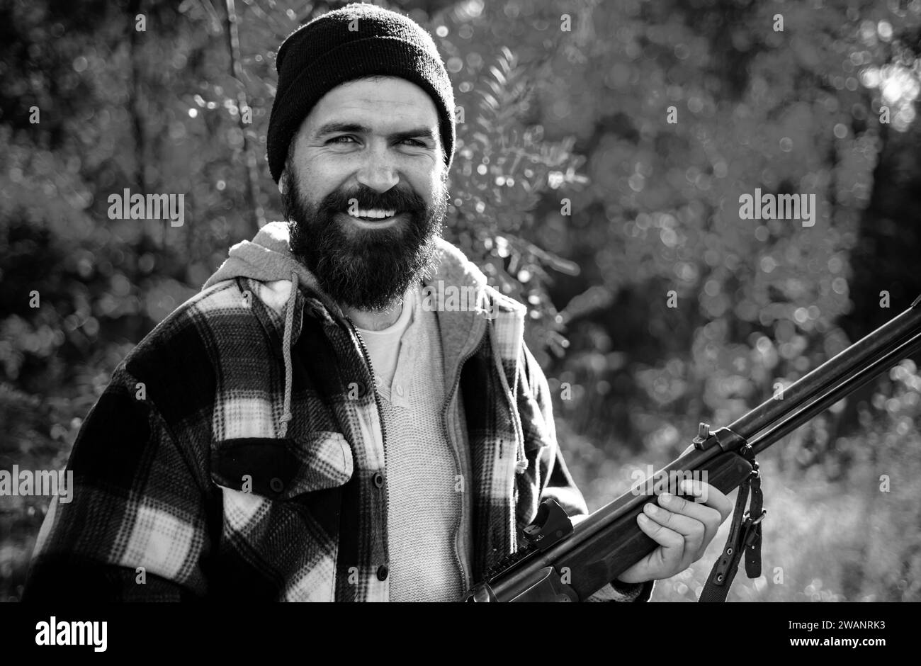 Closed and open hunting season. Hunter with shotgun gun on hunt. Close ...