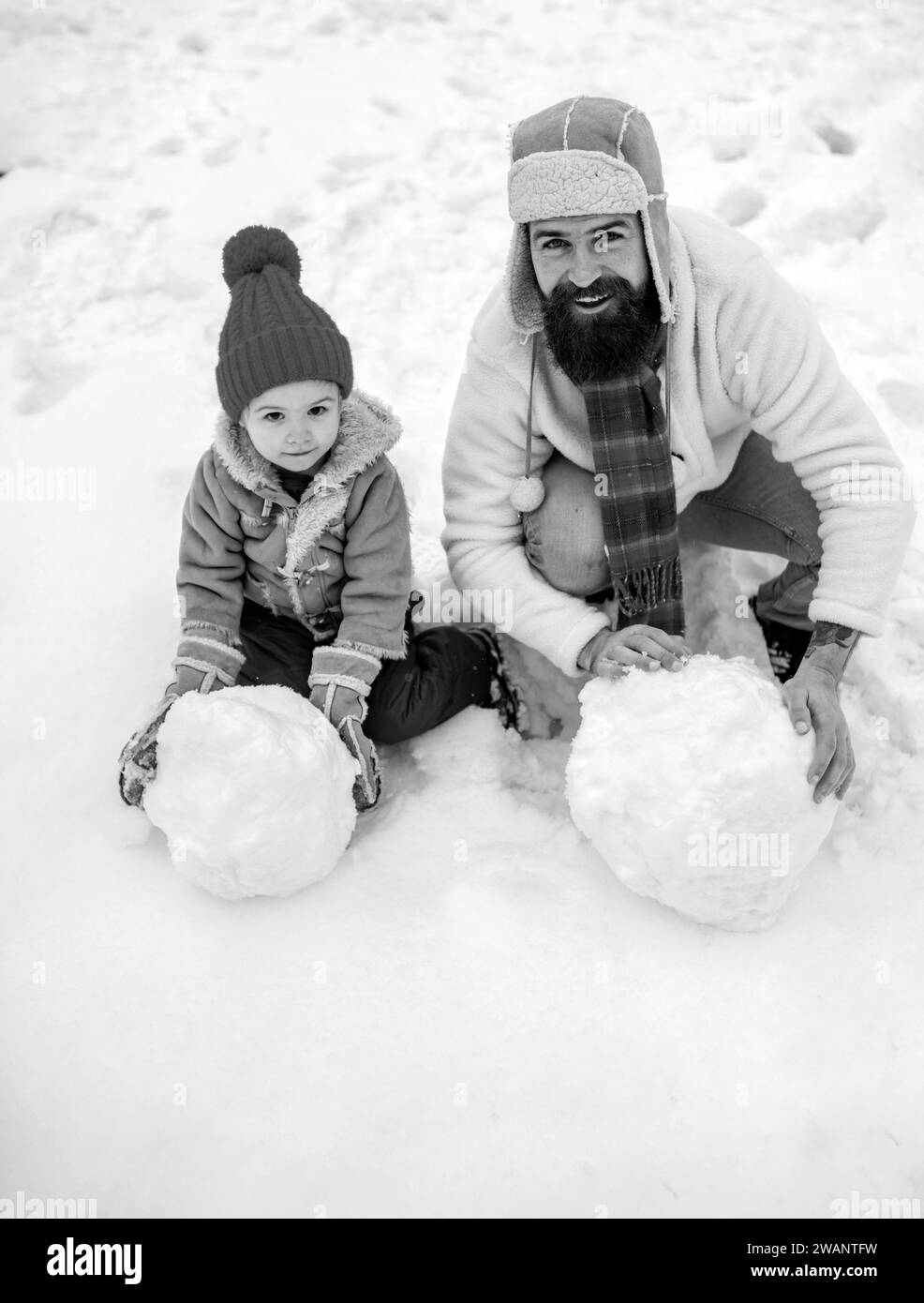 Father son making christmas Black and White Stock Photos & Images - Alamy