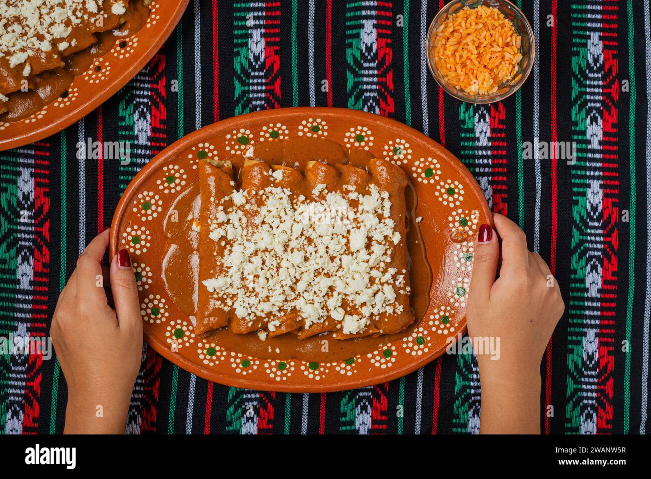 Enchiladas with red pipian. Typical Mexican food Stock Photo - Alamy