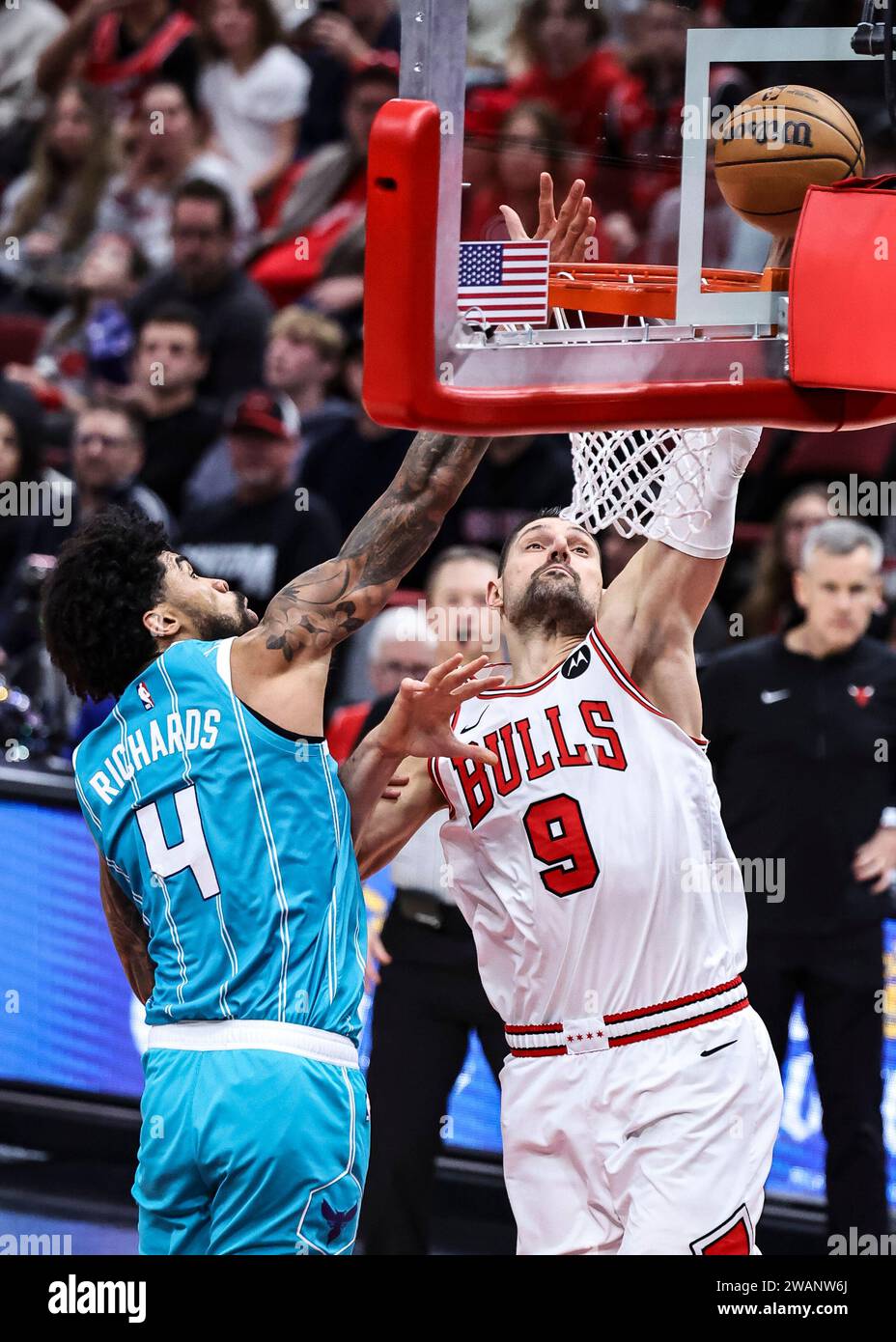 Chicago, USA. 5th Jan, 2024. Chicago Bulls center Nikola Vucevic (R ...