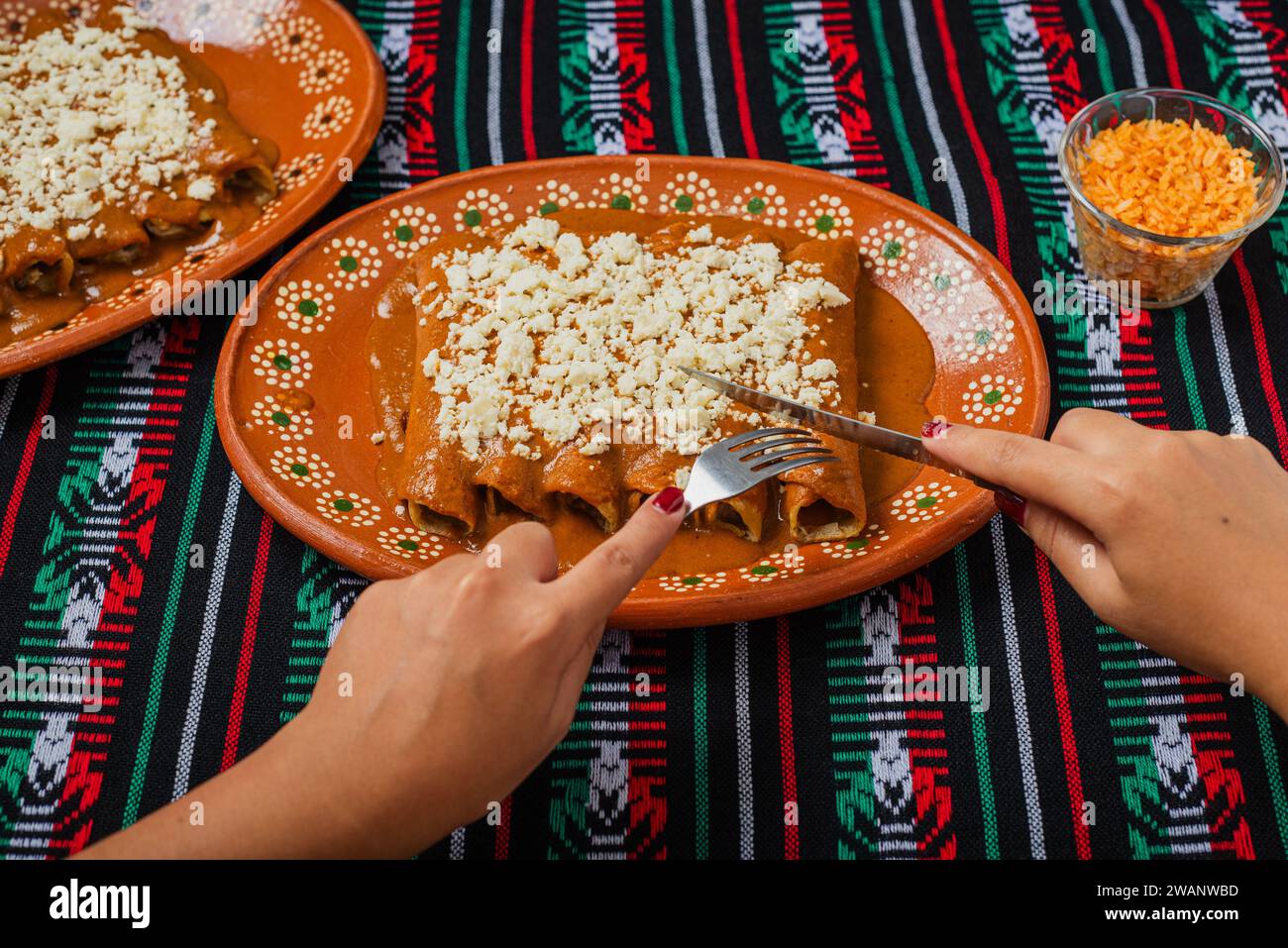 Enchilada eating hi-res stock photography and images - Alamy