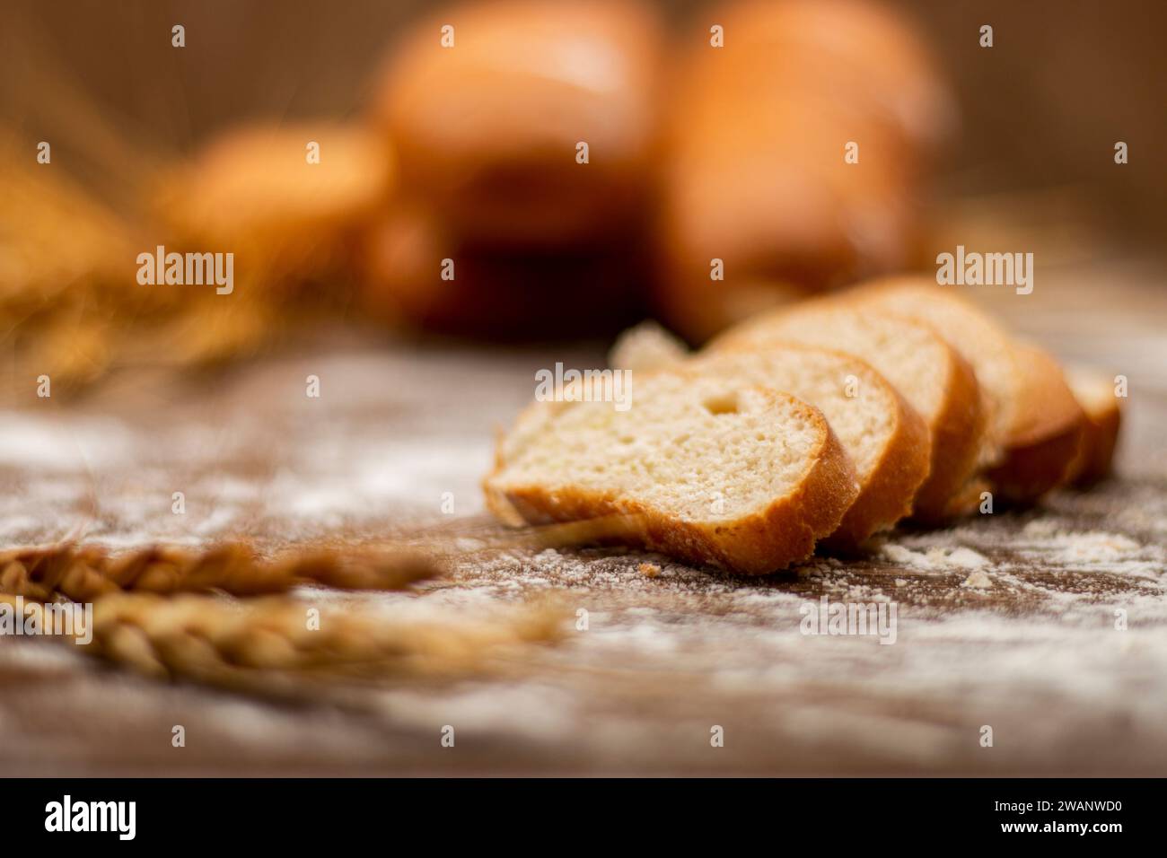 Various types of savory bread including ciabatta baguette and whole ...
