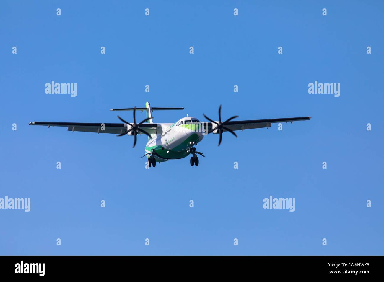 Airplane from the Binter Canarias Type ATR 72 on approach for landing ...